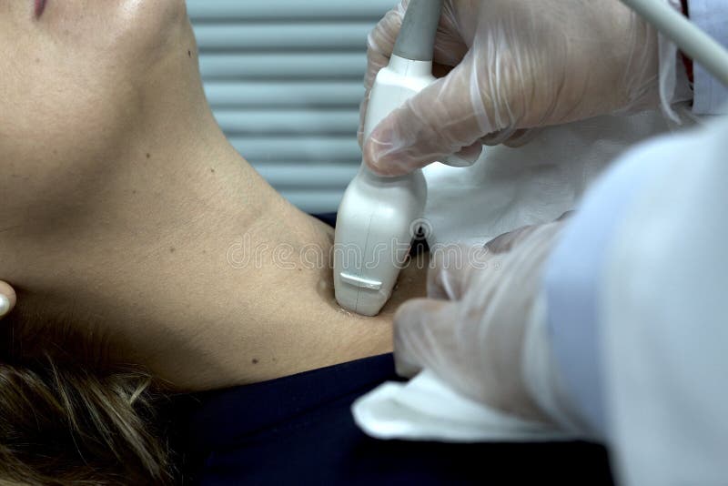 Endocrine Doctor Performing a Thyroid Ultrasound on a Patient Close-up ...