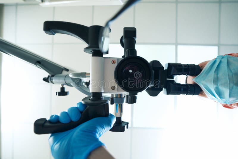 Endodontist Conducting Dental Exam Using Modern Diagnostic Equipment ...