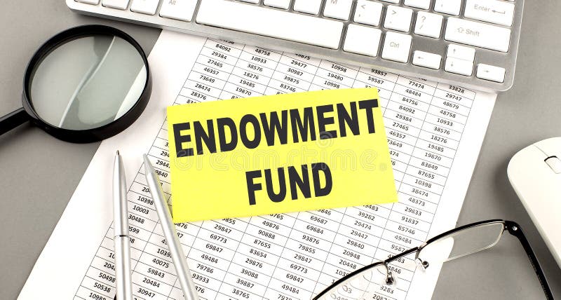 ENDOWMENT FUND Text Written on a Sticky on Chart with Keyboard and ...