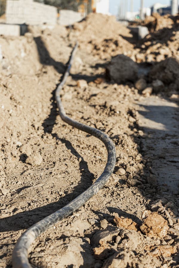 The Ends of the Electrical Cable in the Trench. Electrical Cable ...