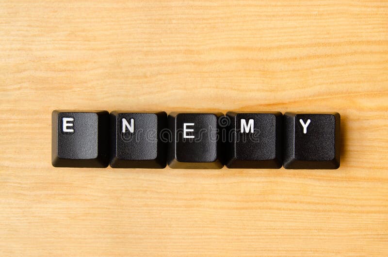 Enemy Word on the Red Enter Key of a Desktop Pc Keyboard. Laptop ...