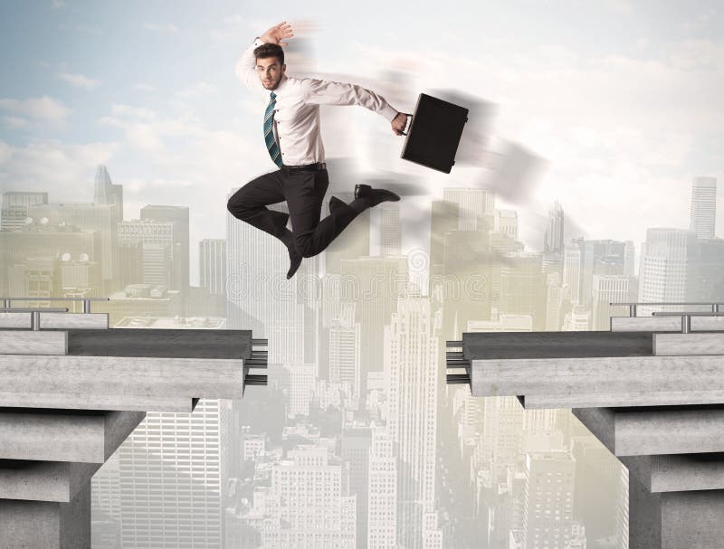 Energetic Business Man Jumping Over a Bridge with Gap Stock Photo ...