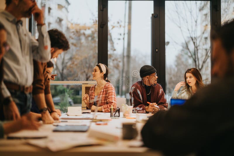 Diverse Office Team Engaged Lively Discussion Bright Workspace Stock ...