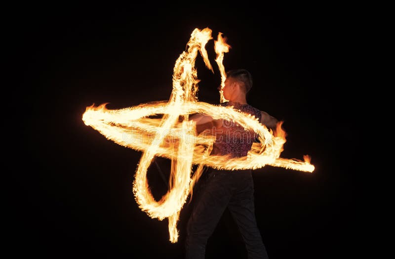 Energetic Man Performer Create Sparkling Fire Patterns Twirling Burning ...
