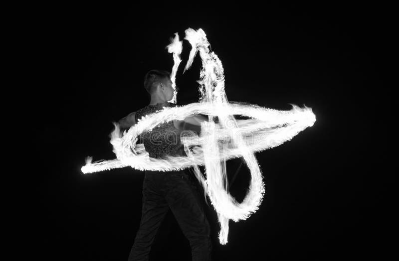 Energetic Man Performer Create Sparkling Fire Patterns Twirling Burning ...