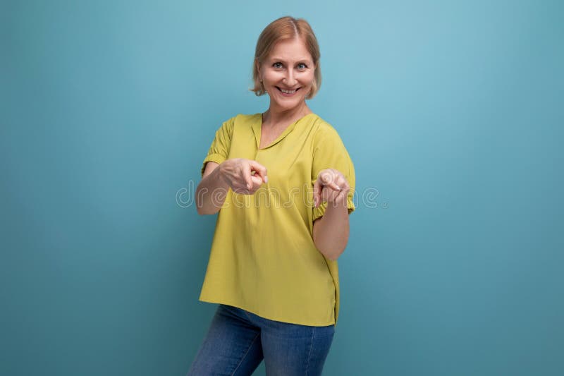 Energetic Mature Woman Pointing Finger at Camera Stock Photo - Image of ...