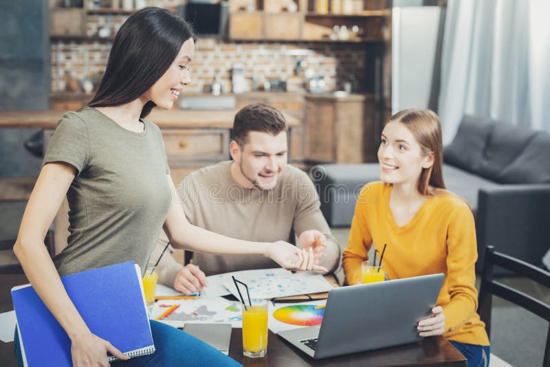Energetic Three Students Uniting Efforts Stock Image - Image of ...