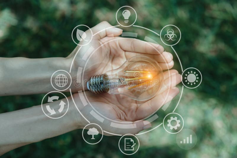 Energy Saving Concept. Earth at Night Was Holding in Human Hands with ...