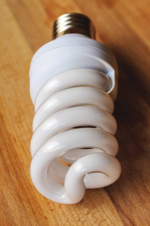 Energy saving lamp stock photo. Image of isolated, save - 67108682