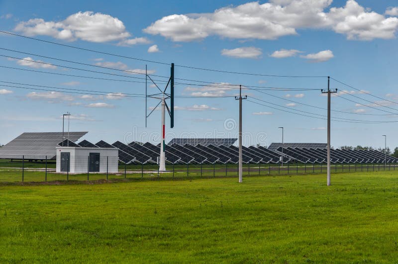 Energy from the Sun and Wind Station. Stock Photo - Image of field ...