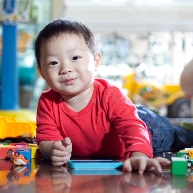 Enfant chinois image stock. Image du people, construction - 27554589