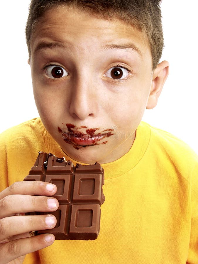 Enfant Expressif Mangeant Du Chocolat Image stock - Image du diabète ...