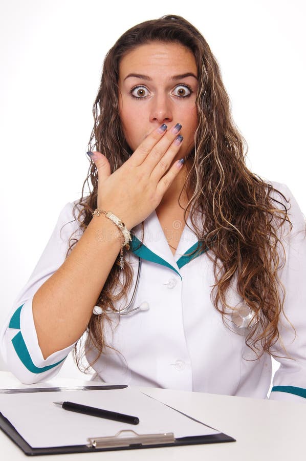 Enfermeira Bonito Na Tabela Foto de Stock - Imagem de postura, chocado ...