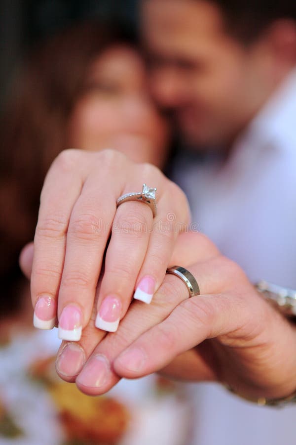 Engaged Couple Expressing Their Love Stock Photo - Image of holding ...