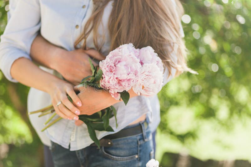 Engaged couple hug stock photo. Image of people, holiday - 82803248