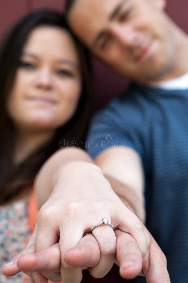 Engaged Couple Shows Diamond Ring Stock Photo - Image of love ...