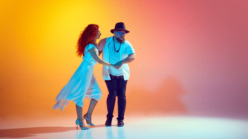 Engaged in Energetic Salsa Training Session, Dancers Work on Perfecting ...