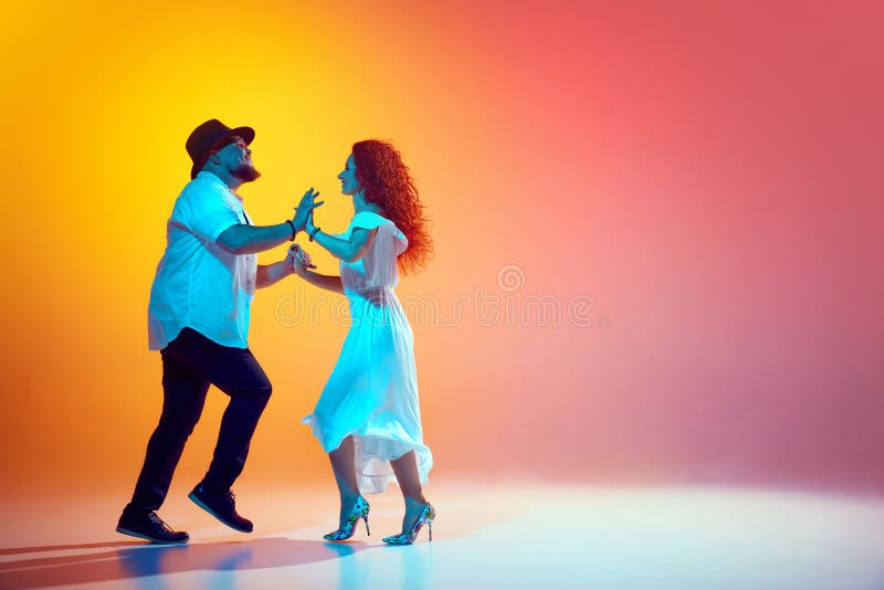 Engaged in Lively Salsa Training Session, Dancers Work on Coordination ...