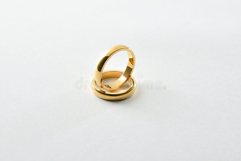 Engagement Gold Ring Standing Inside of Each Other on White Textured ...