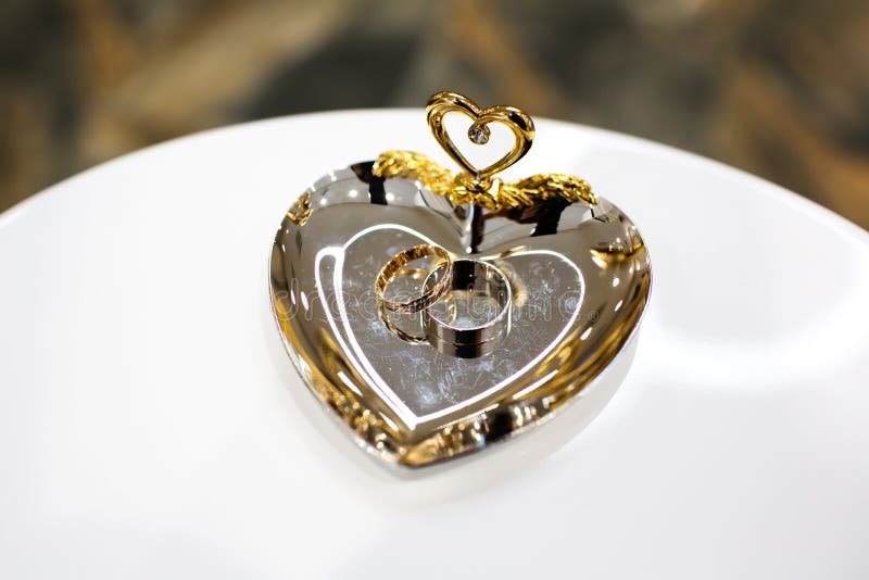 Engagement Gold Rings on Stand Stock Image - Image of event, love: 81654031