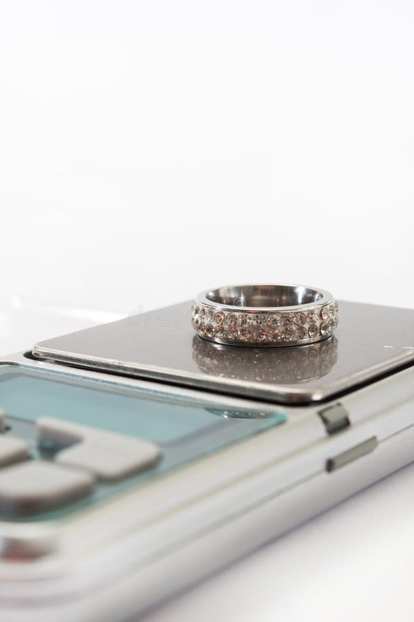 Engagement Ring on a Digital Scale Stock Photo - Image of married ...