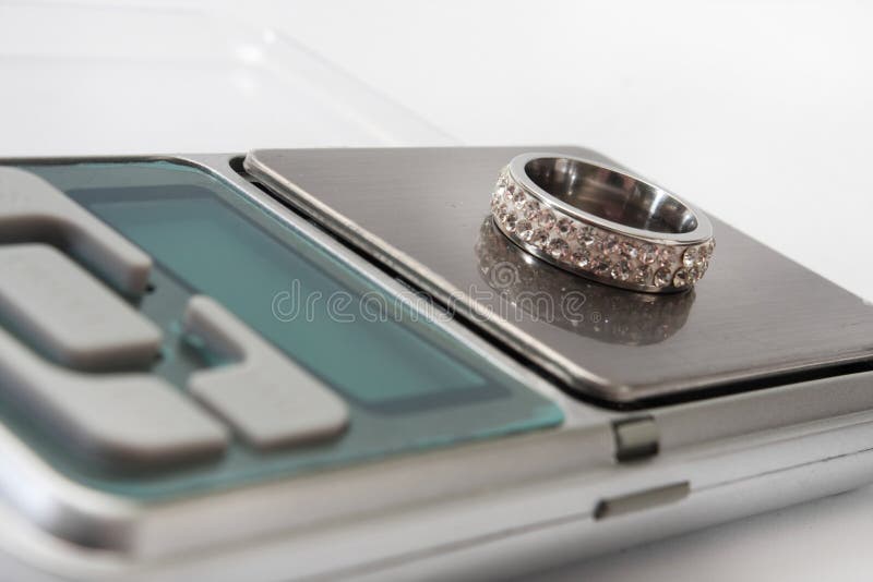 Engagement Ring on a Digital Scale Stock Photo - Image of celebration ...