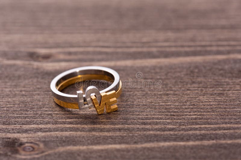 Engagement Ring on Wooden Table Stock Image - Image of love, engagement ...
