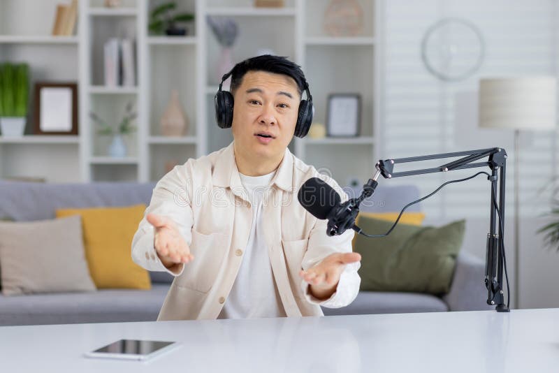Asian Man Talking during a Podcast Recording Session Stock Image ...