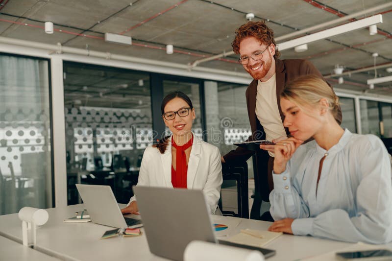 Engaging in Collaborative Teamwork within a Modern Office Environment ...