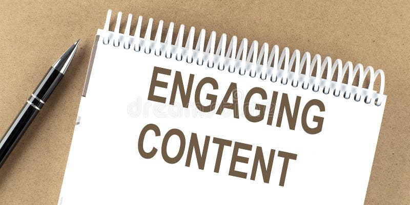 ENGAGING CONTENT Text on a Notepad with Pen, Business Stock ...