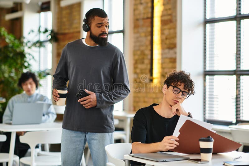 Engaging Conversation between Coworkers in a Stock Image - Image of ...