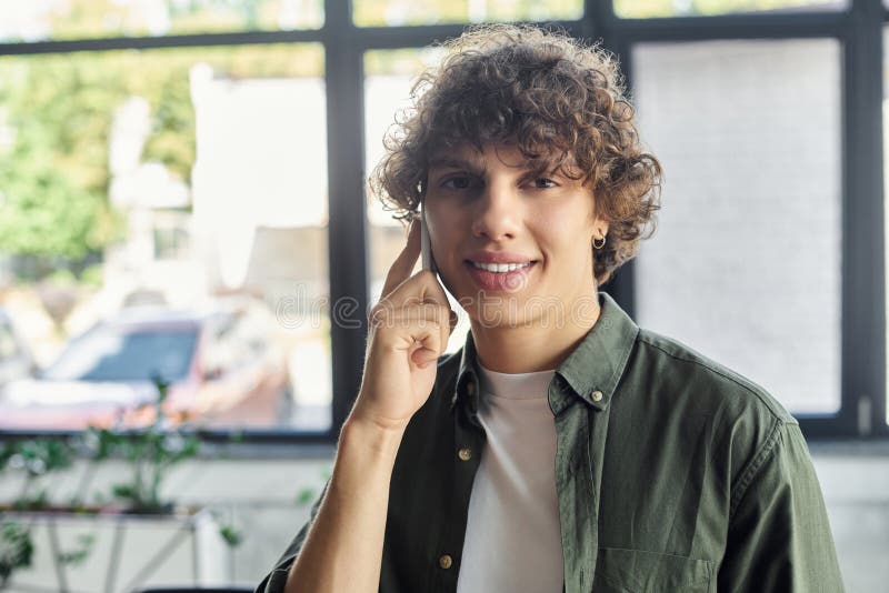 Engaging Conversation in a Modern Office Stock Image - Image of ...