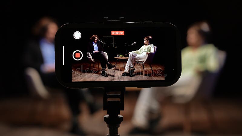 Engaging Conversation in a Modern Podcast Studio Setting with ...