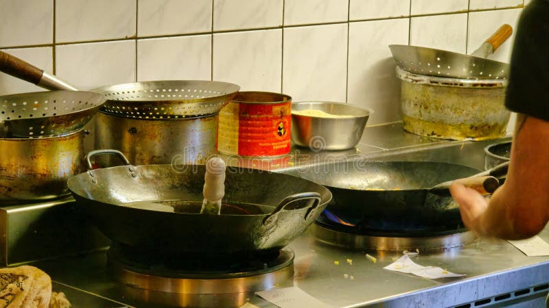 Engaging Culinary Action Unfolds within a FastPaced Kitchen Setting ...