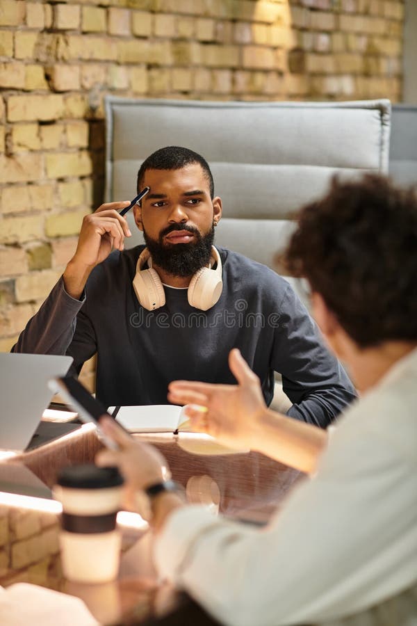 Engaging Discussion between Colleagues in a Stock Image - Image of ...