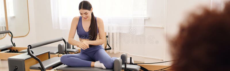 Engaging in a Focused Stretch Session Stock Photo - Image of instructor ...