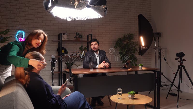 Engaging Interview in a Modern Studio Setting Featuring Two Speakers ...