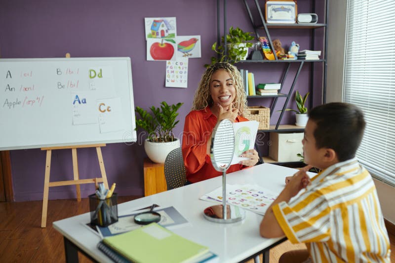 Engaging in Language Learning Session with Young Student Stock Photo ...