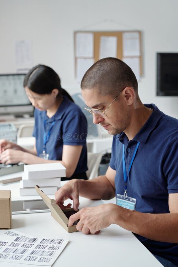 Engaging in Office Tasks with Technology and Devices Stock Image ...