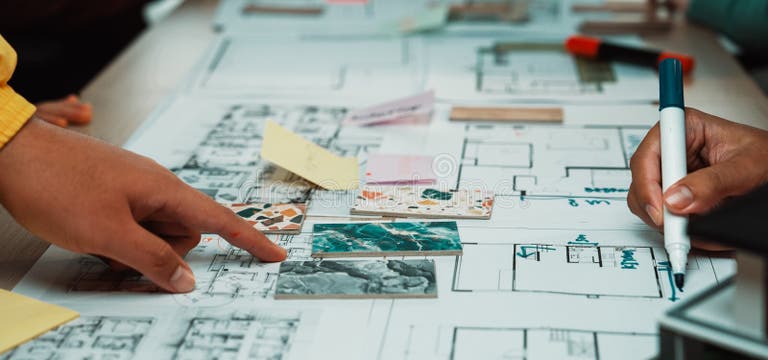 Collaborative Team Planning Session with Architectural Layout and ...