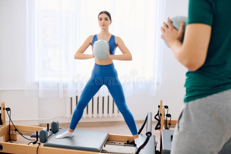 Engaging Workout Session in a Bright Stock Image - Image of pose ...