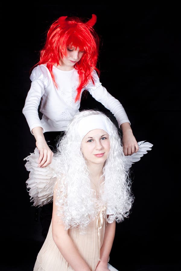 Engel en Demon stock foto. Image of mooi, goed, emoties - 21454528