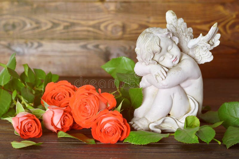 Engel, Rosen Und Altes Buch Auf Schmutzhintergrund Stockbild - Bild von ...