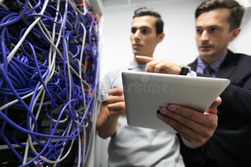 Engeneers in Network Server Room Stock Image - Image of network ...