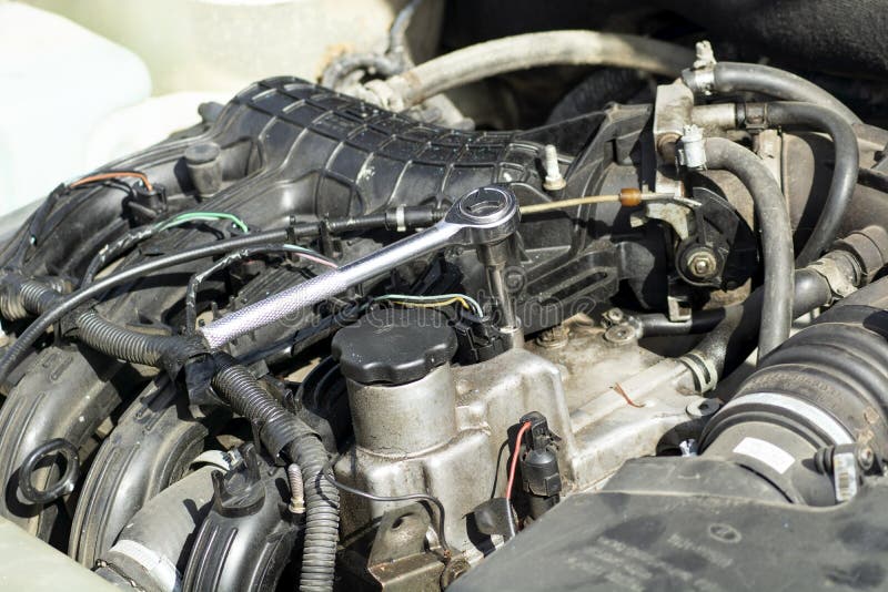 The Engine from the Car and the Key. Stock Image - Image of green, bows ...