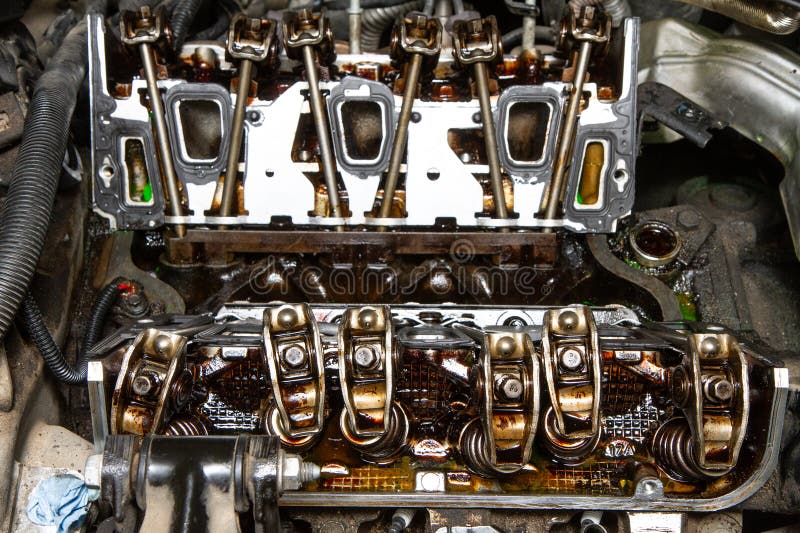 The Engine of a Car is Open and the Valves are Visible Stock Photo ...