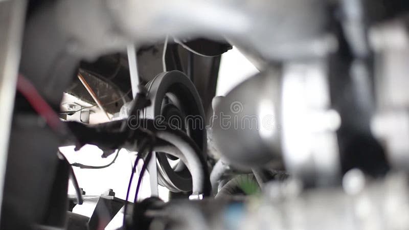 The Engine of the Car, in a Running Car, the Movement of the Belt ...