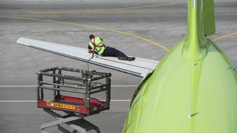Engineer Checks the Operation of the Hatch of the Front Landing Gear of ...