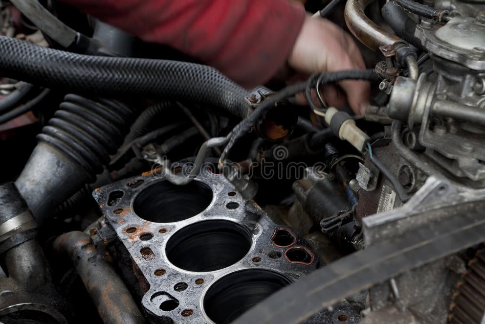 Engine check up stock image. Image of checking, handy - 21917545