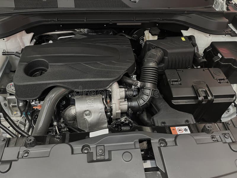 The Engine Compartment of the Car, a View of the Engine. Four-cylinder ...
